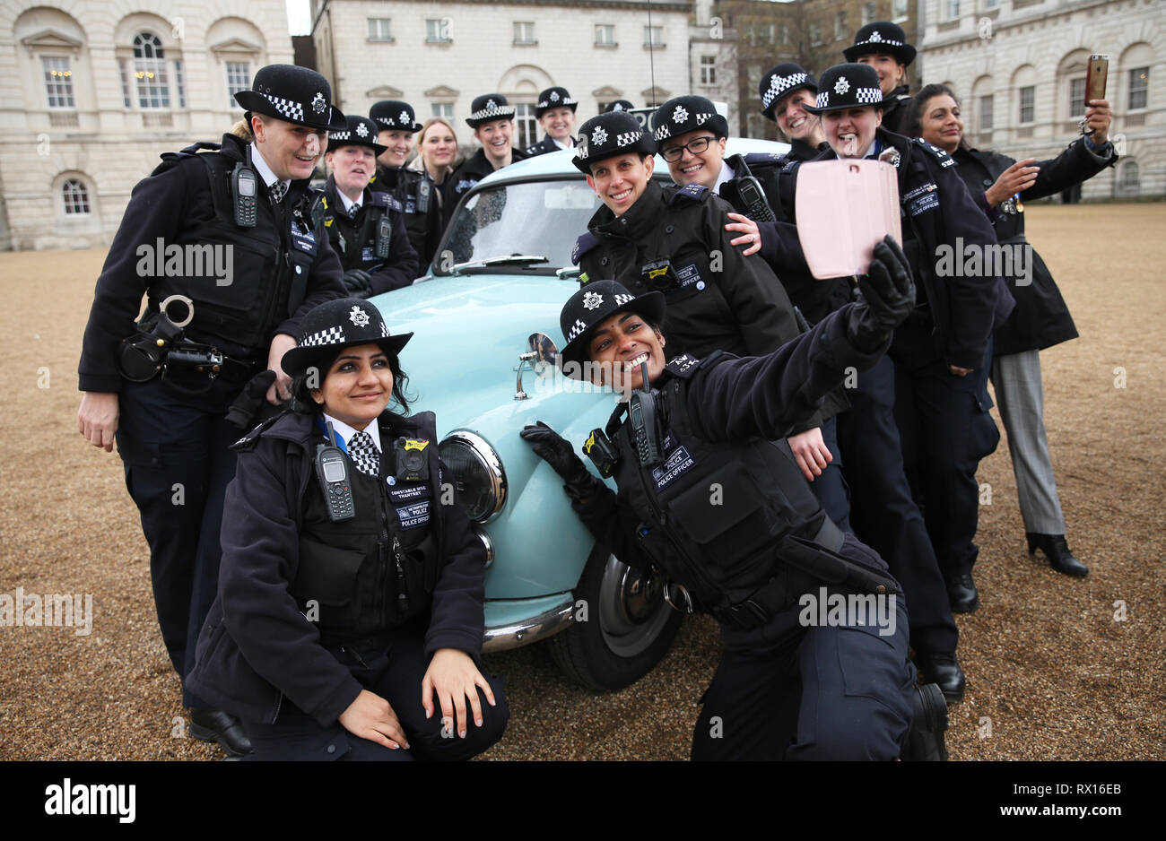 Women officers and staff from the Metropolitan Police take part in ...