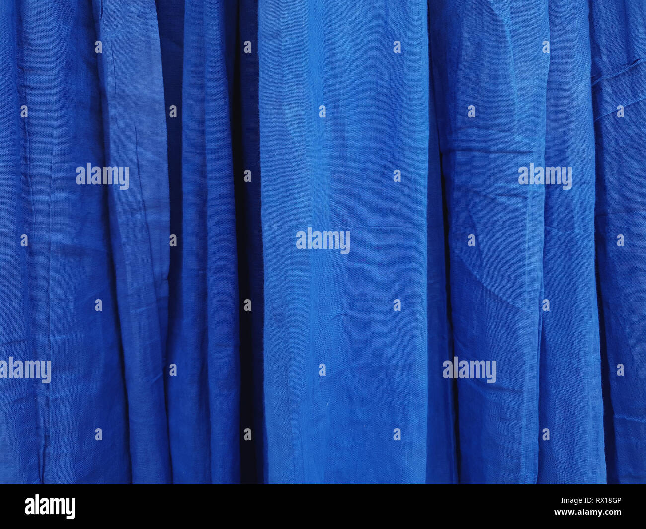 Blue folds fabric,the bright abstract blue background Stock Photo - Alamy