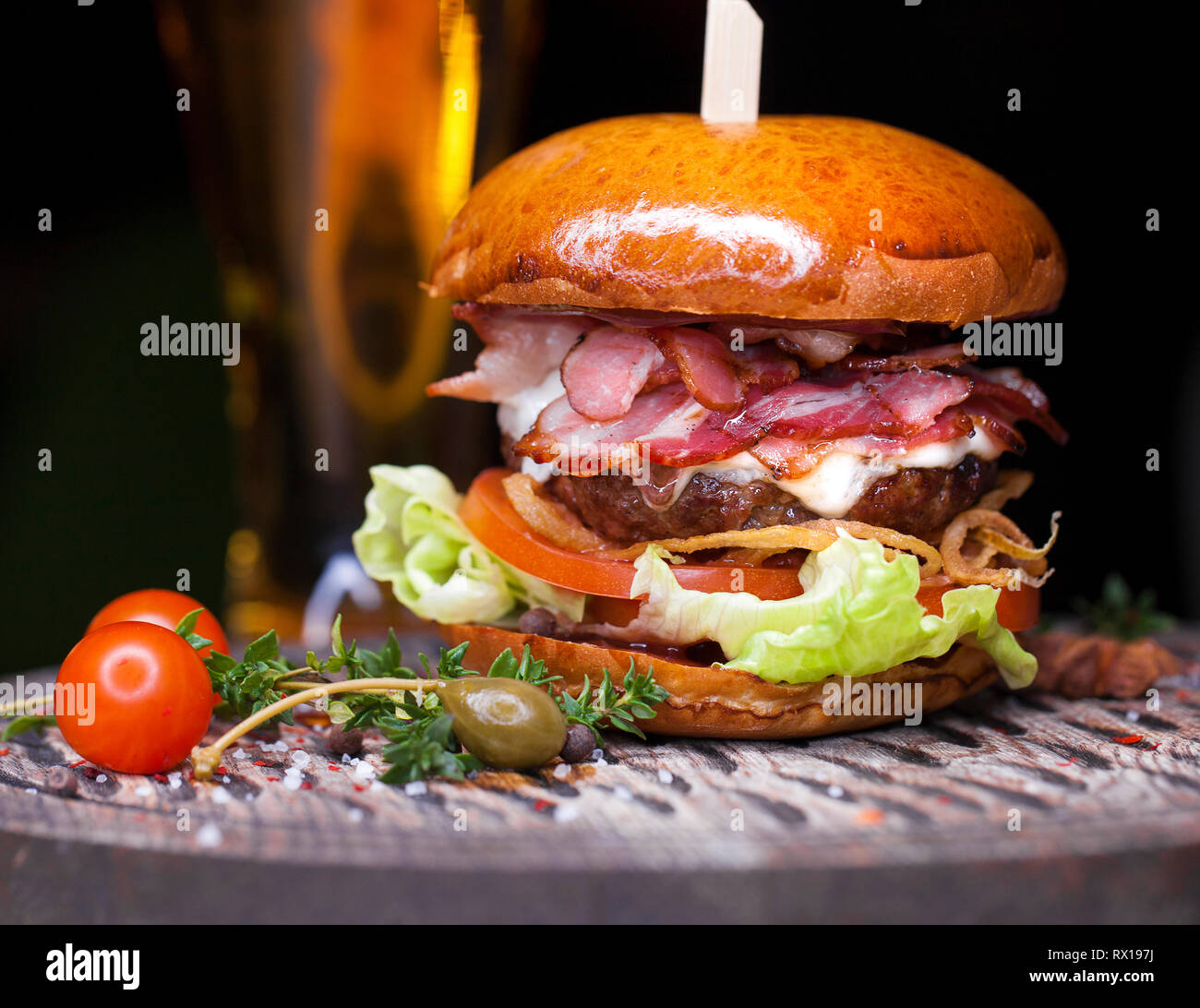 Fast food closeup with traditional tasty hamburger Stock Photo - Alamy