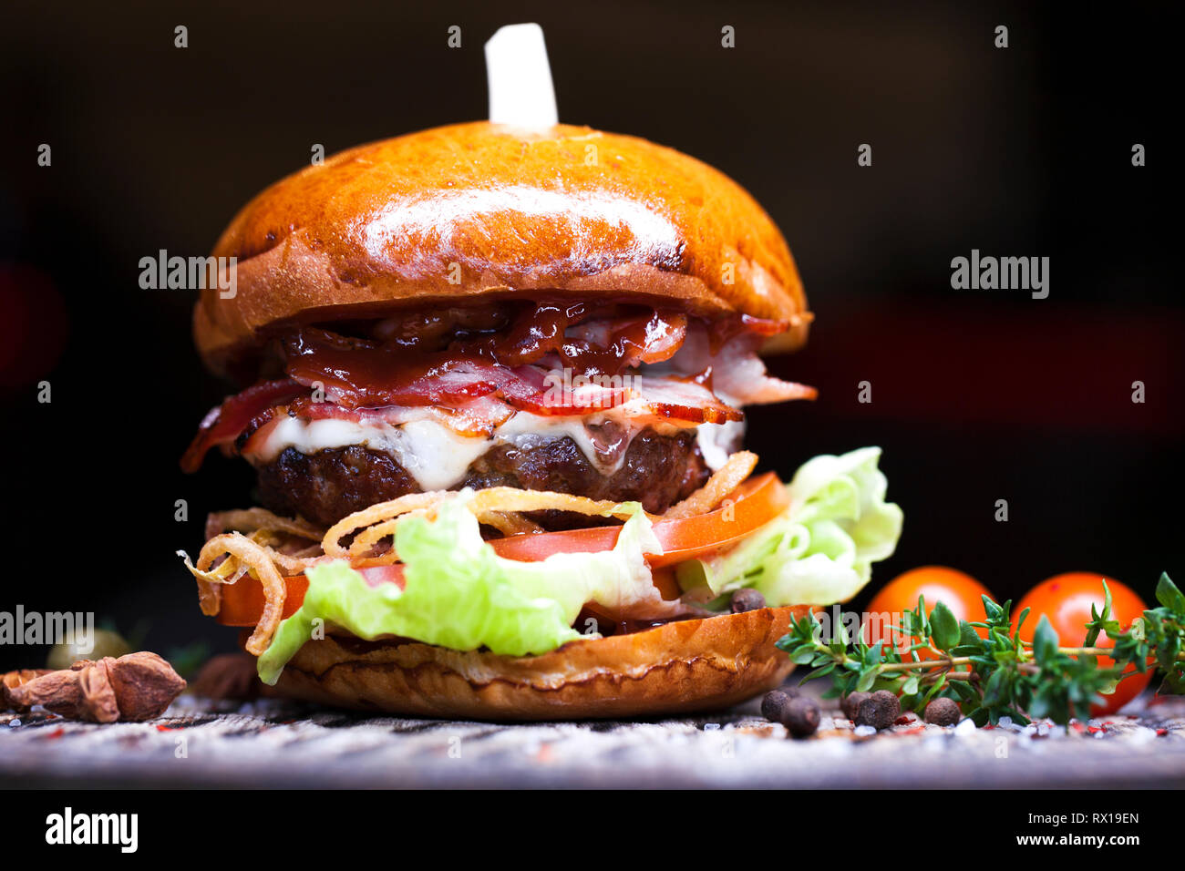 Fast food closeup with traditional tasty hamburger Stock Photo - Alamy