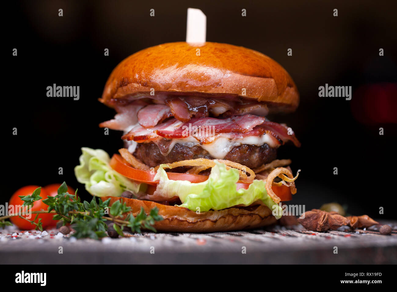 Fast food closeup with traditional tasty hamburger Stock Photo - Alamy