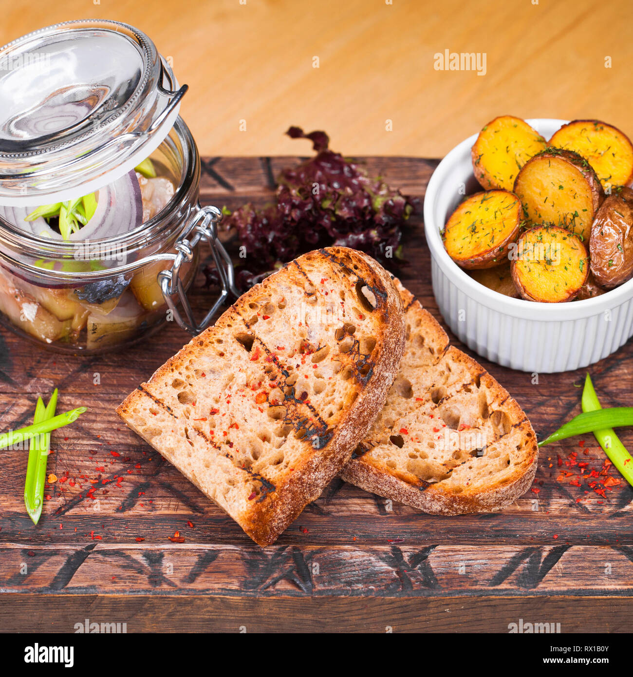 Restaurant dish - Marinated mackerel in a glass jar - snack under vodka ...