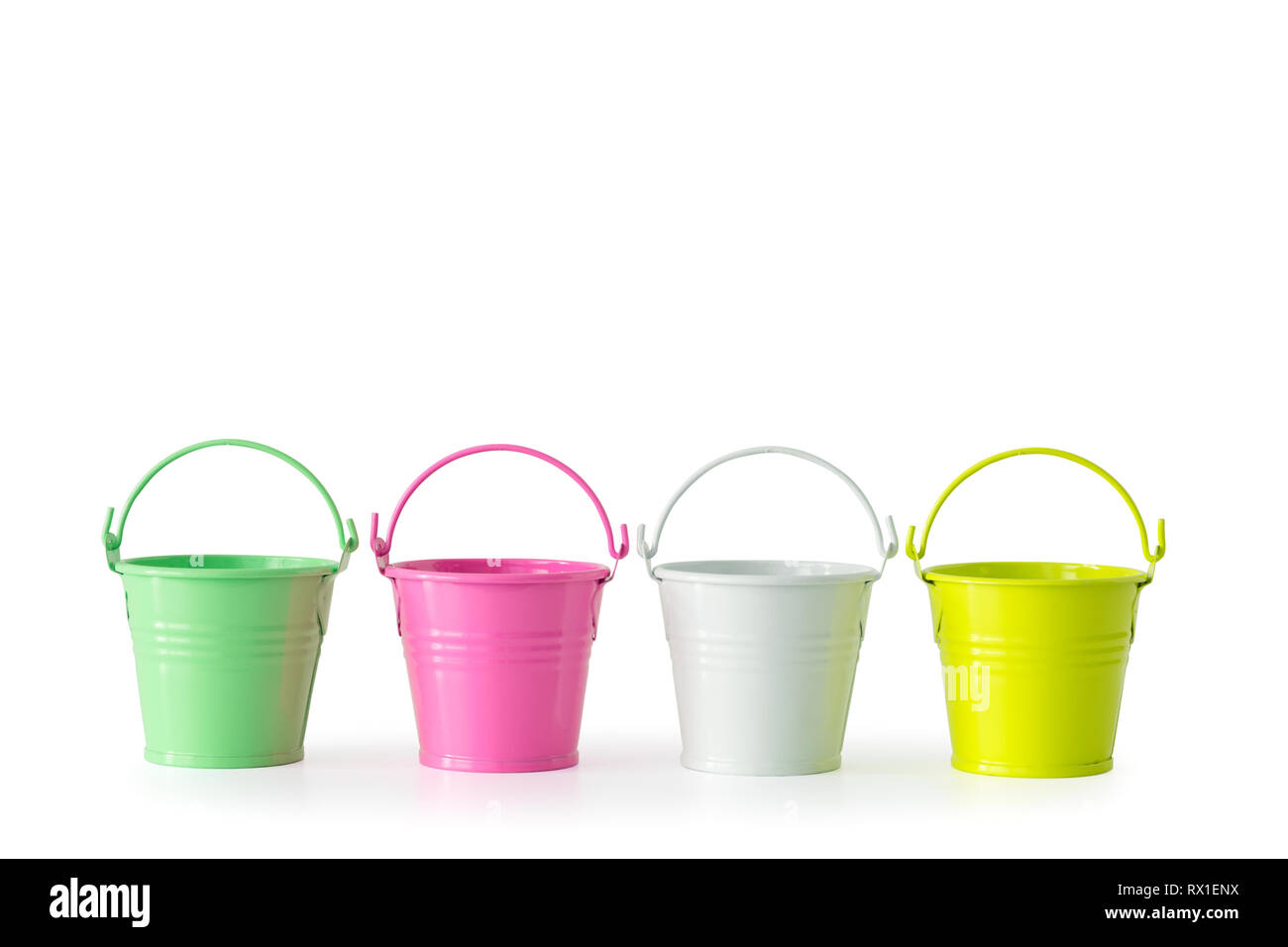Four colorful buckets on white background Stock Photo - Alamy