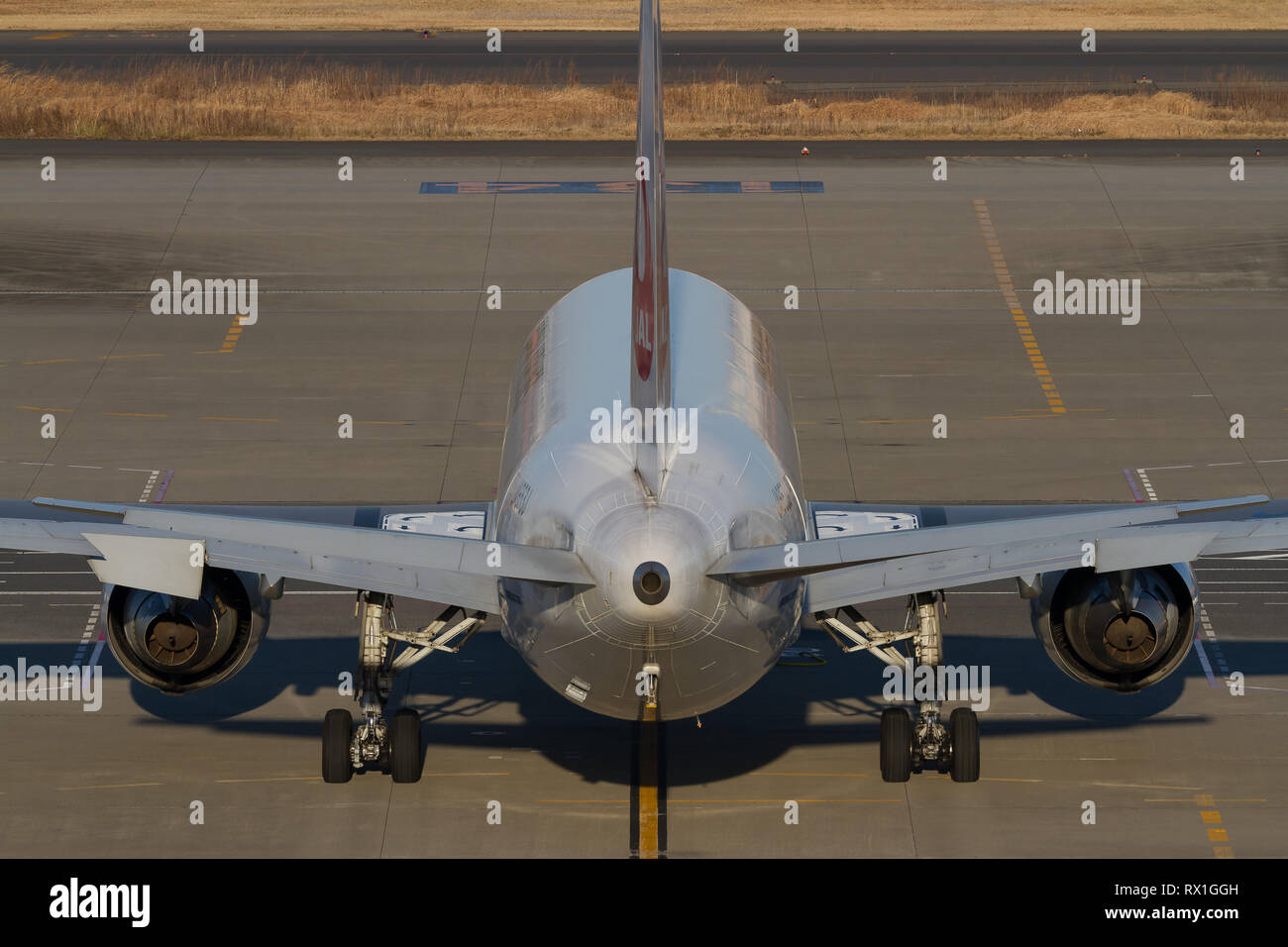 A rear view of a Japan Airlines (JAL) Boeing 767-346 (ER) airliner at ...
