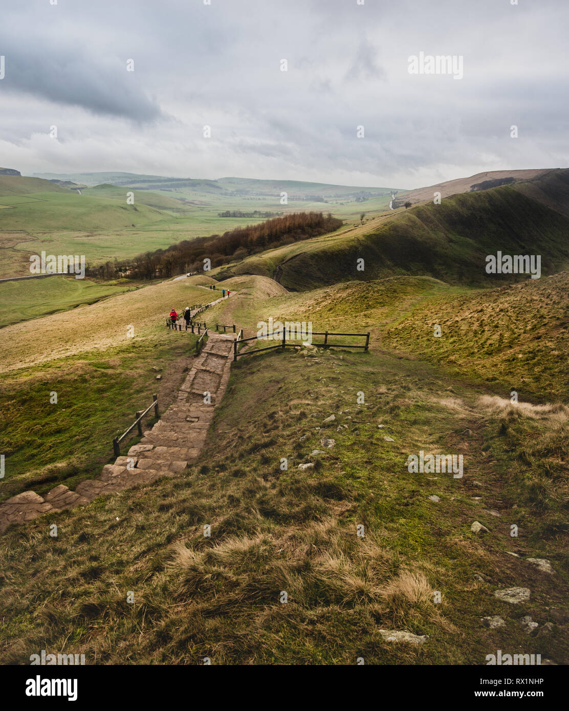 A path runs through the Peak District from Mam Tor on a windy winters ...