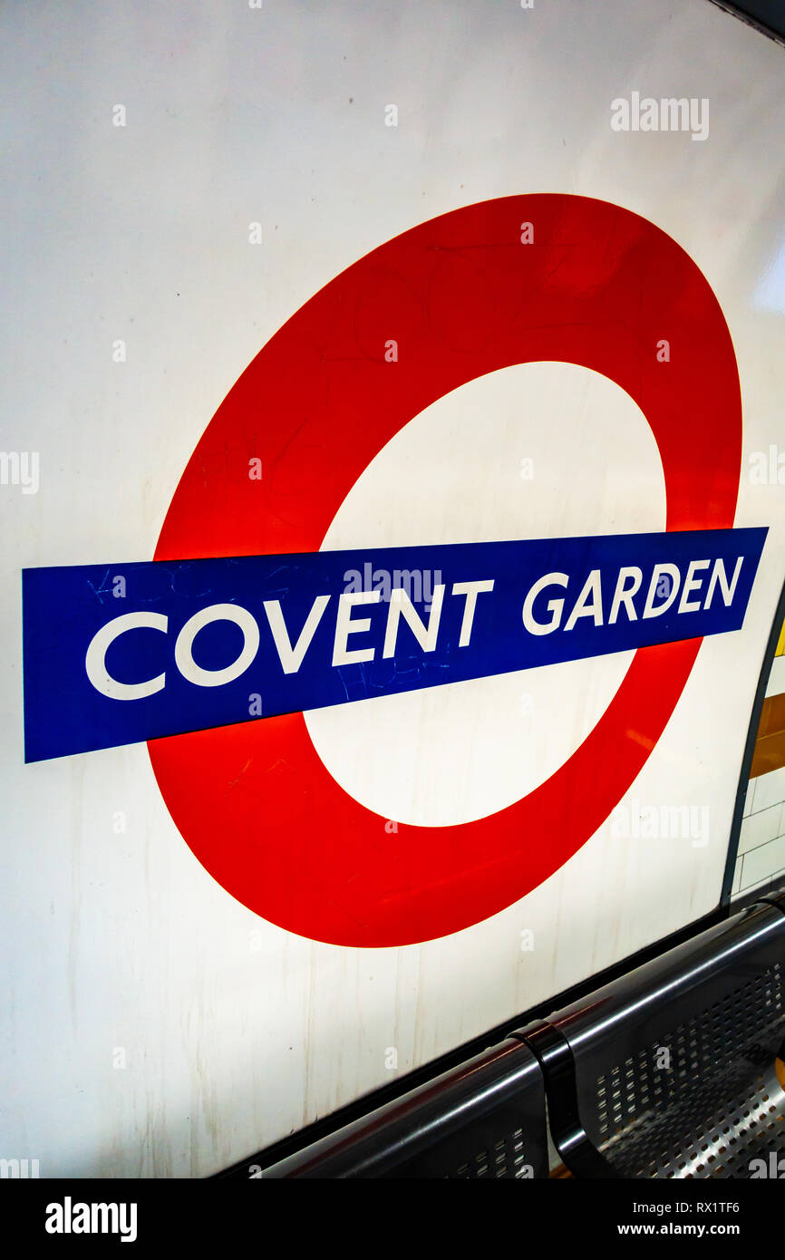 Iconic circular London Tube sign on the underground platform at Covent ...