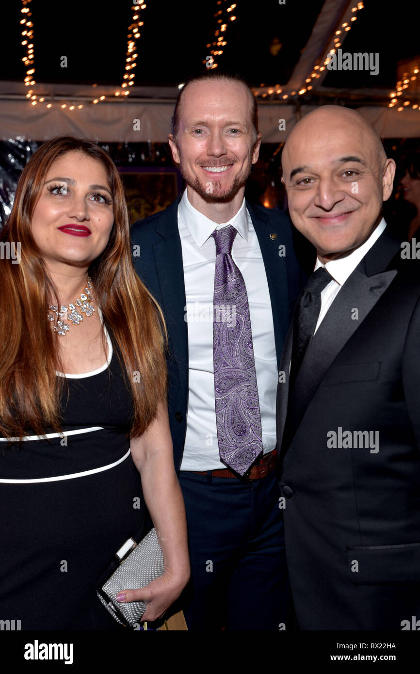BEVERLY HILLS, CA - FEBRUARY 24: Merry Akram, Jared Day, and Omar Akram ...