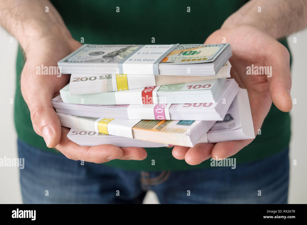 Man holding stack money hi-res stock photography and images - Alamy