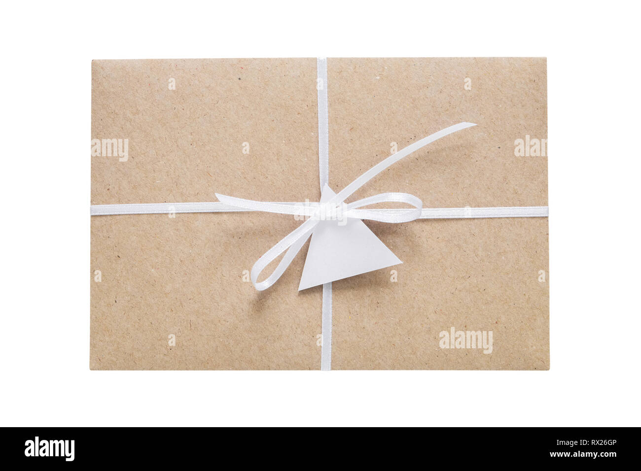 Envelope from craft paper decorated with ribbon and label. Isolated on ...