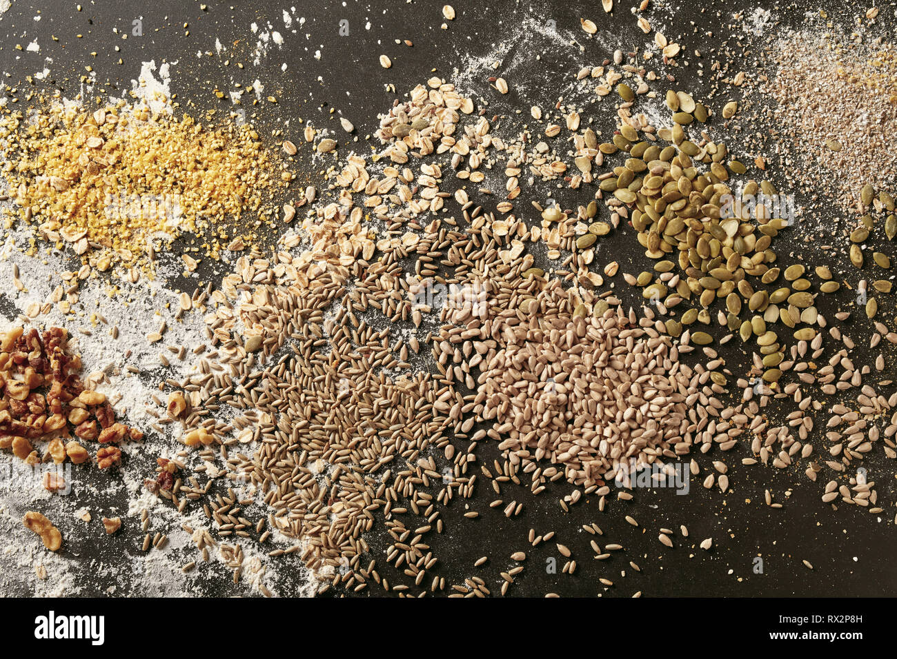 Assortment of whole grain and sunflower seeds for baking bread ...