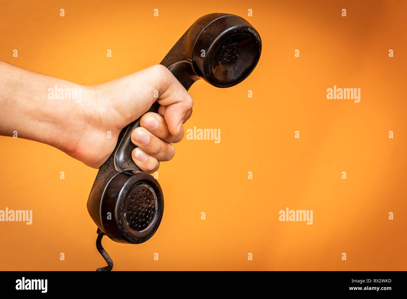 Hand holding receiver hi-res stock photography and images - Alamy