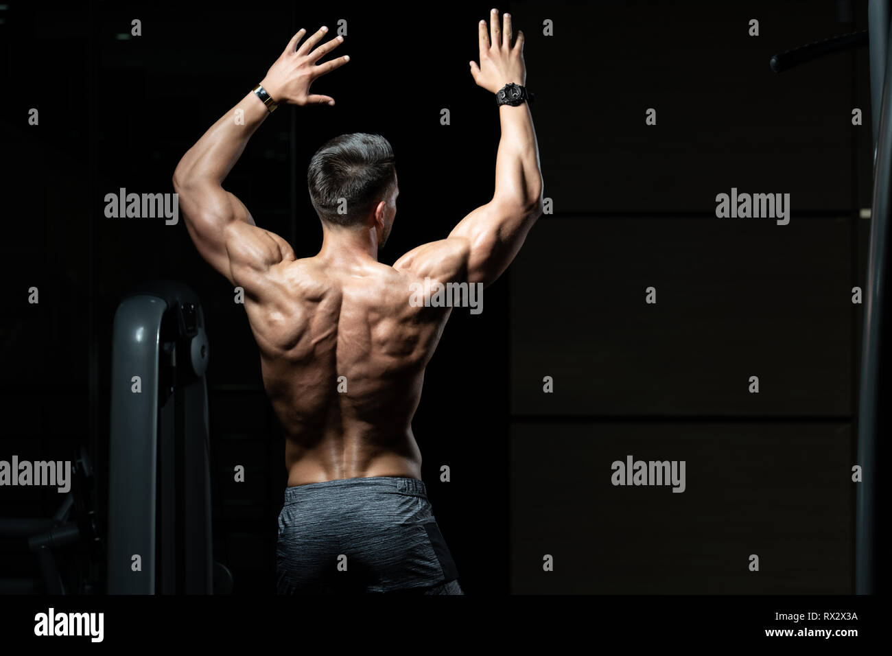 Portrait Of A Young Physically Fit Man Showing His Well Trained Body ...