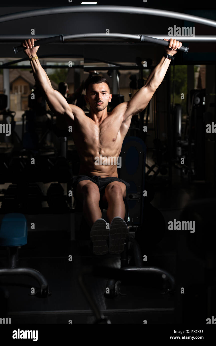 Model Performing Hanging Leg Raises Exercise - One Of The Most ...