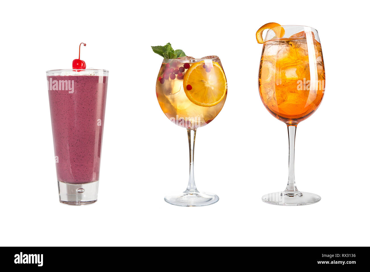 A variety of alcoholic drinks, beverages and cocktails on a white ...