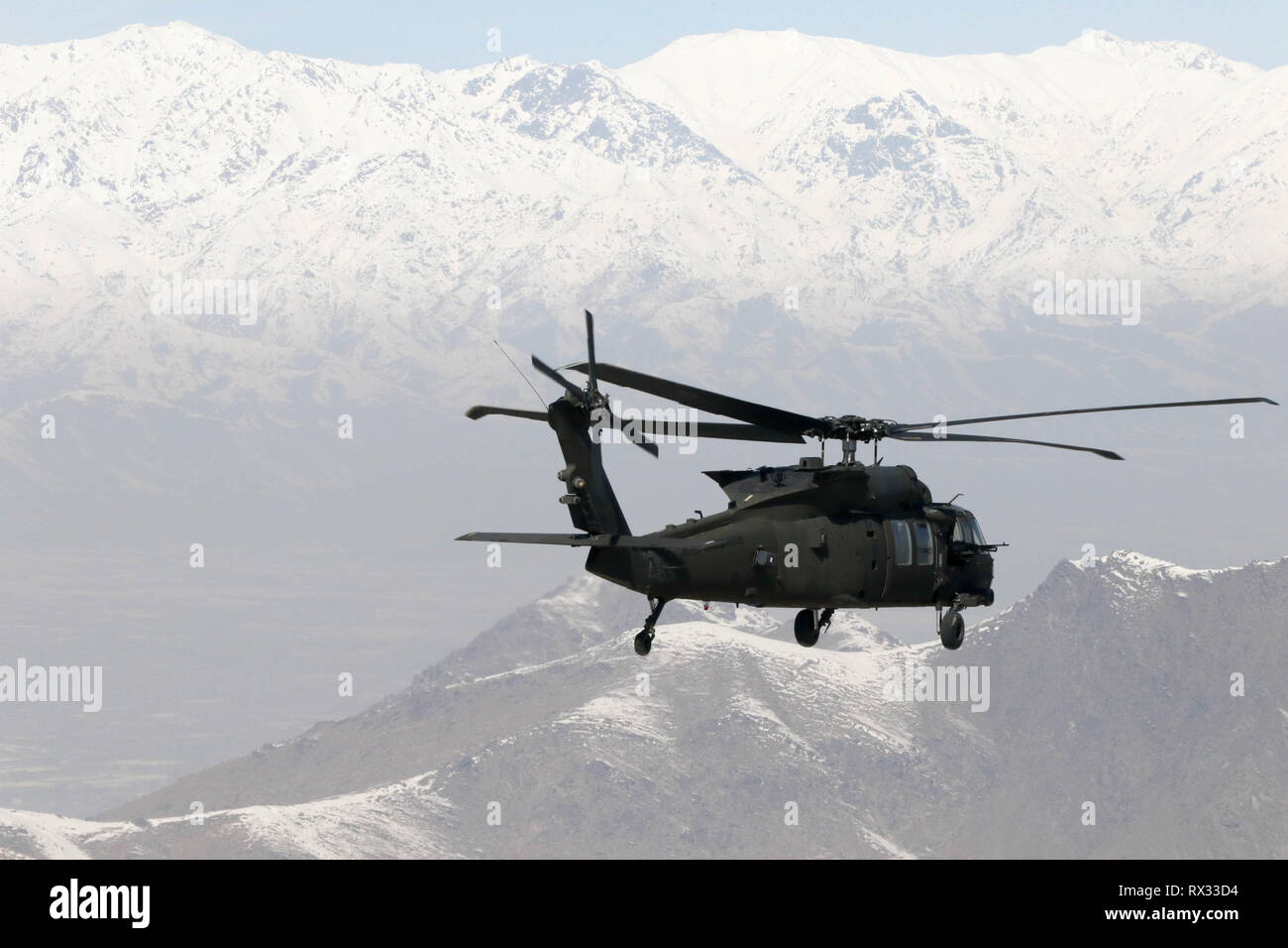 A UH-60 with 1st Armored Division Combat Aviation Brigade transports ...