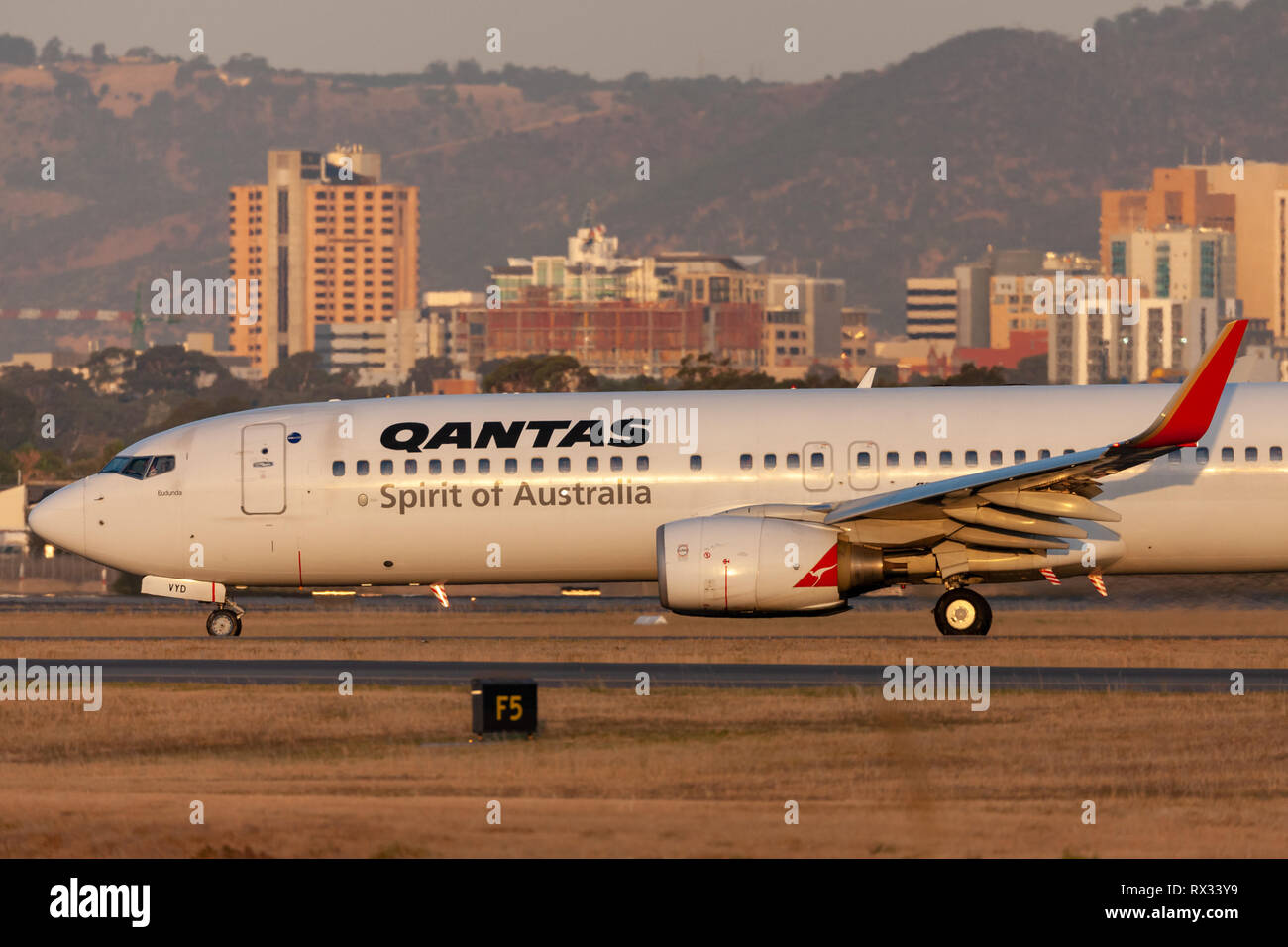 Qantas Boeing 737 on the runway at Adelaide Airport Stock Photo - Alamy