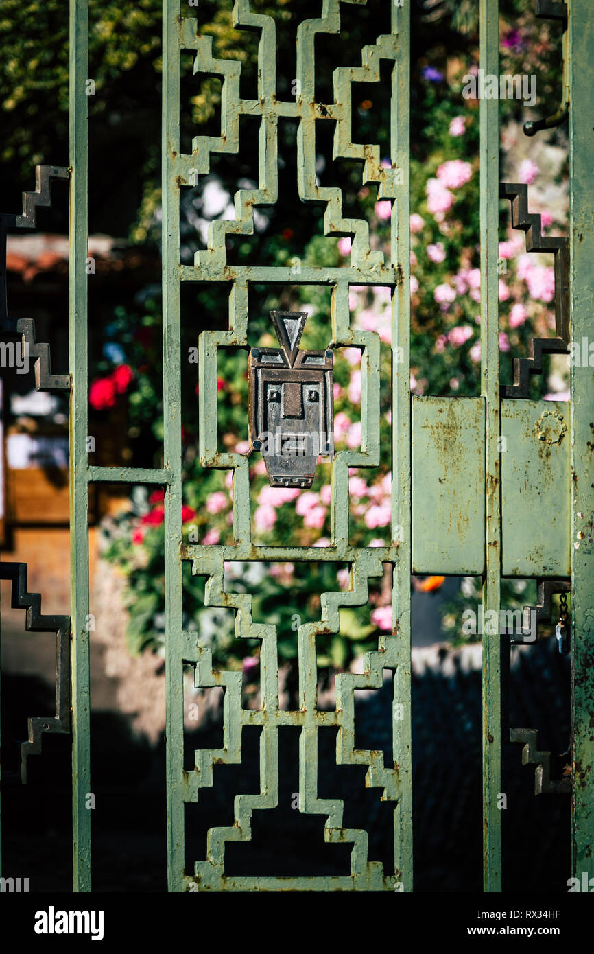 Iron fence with Inca pattern and face motif. Cusco, Peru Stock Photo ...
