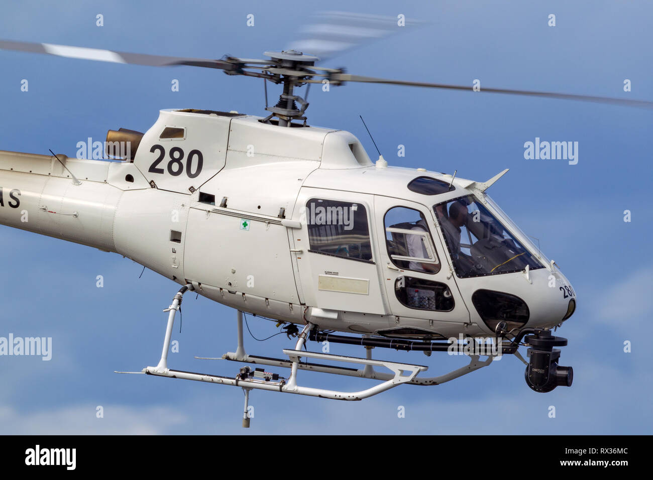 Eurocopter AS-350BA Helicopter conducting aerial filming with a nose ...