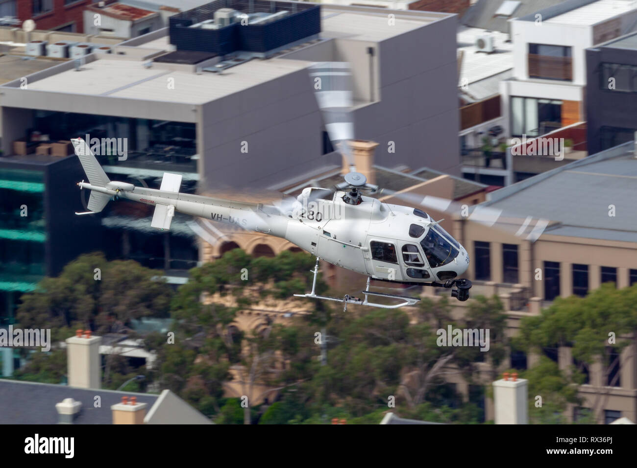 Eurocopter AS-350BA Helicopter conducting aerial filming with a nose ...