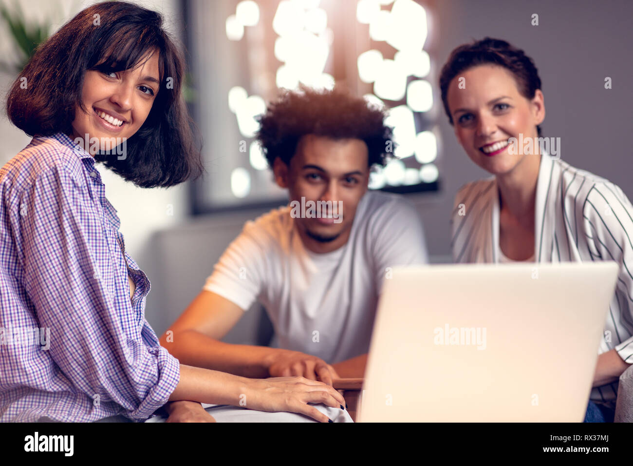 Teamwork concept.Young creative coworkers working with new startup ...