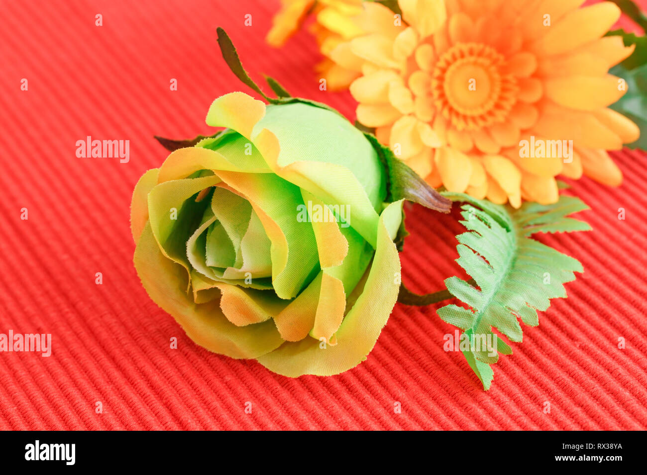 Colorful fabric flowers on cloth background, closeup picture Stock ...