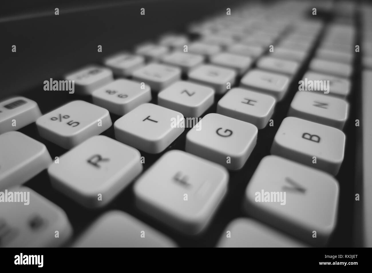 a close-up of a keyboard with white keys Stock Photo - Alamy