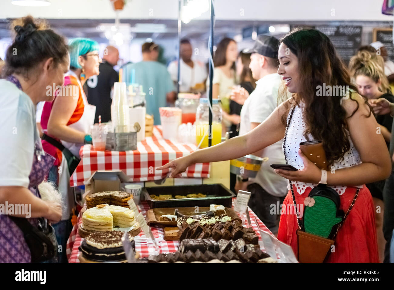 Johannesburg, South Africa, 24th February - 2019: Women purchasing ...