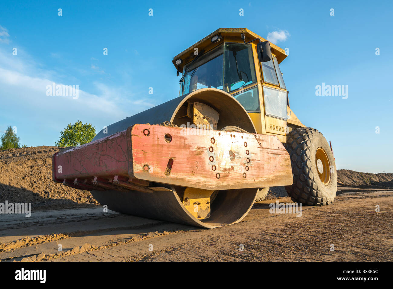 Heavy construction machinery performs work on a construction site Stock ...