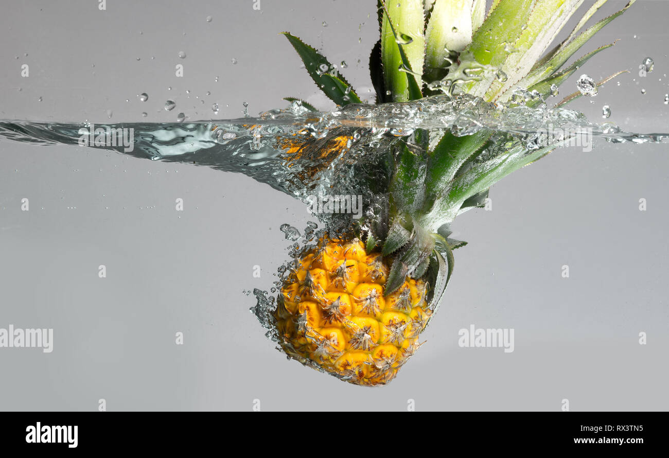 Pineapple juice splash hi-res stock photography and images - Alamy