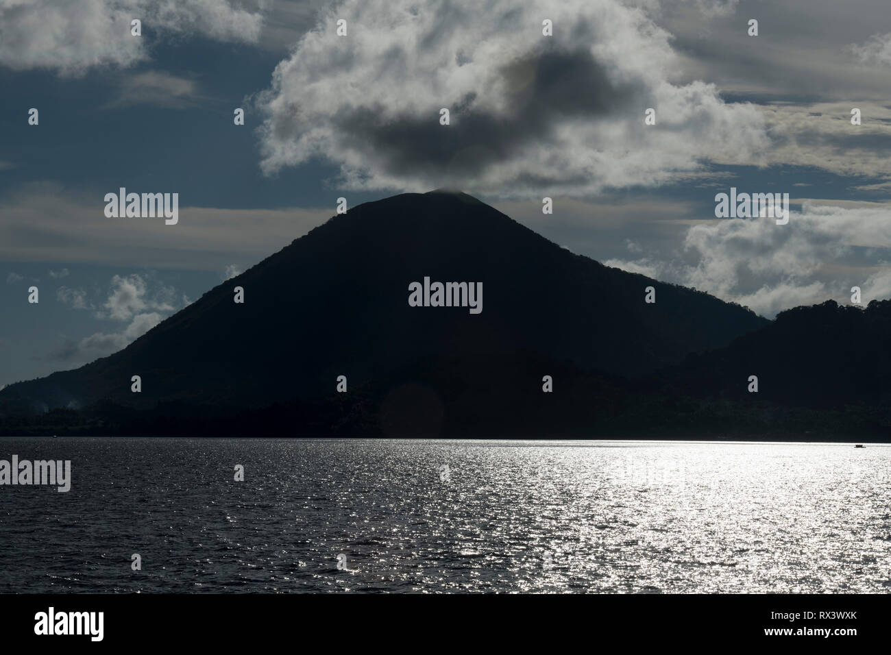 Gunung Api volcano silhouette, Banda Api, near Banda Naira, near Ambon ...