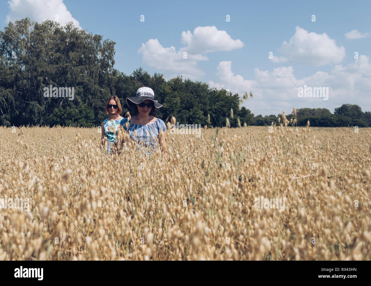 Women walking in rural area hi-res stock photography and images - Alamy