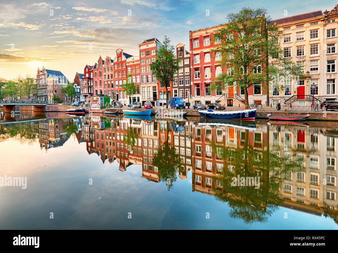 Amsterdam Canal houses vibrant reflections, Netherlands, panorama Stock Photo - Alamy
