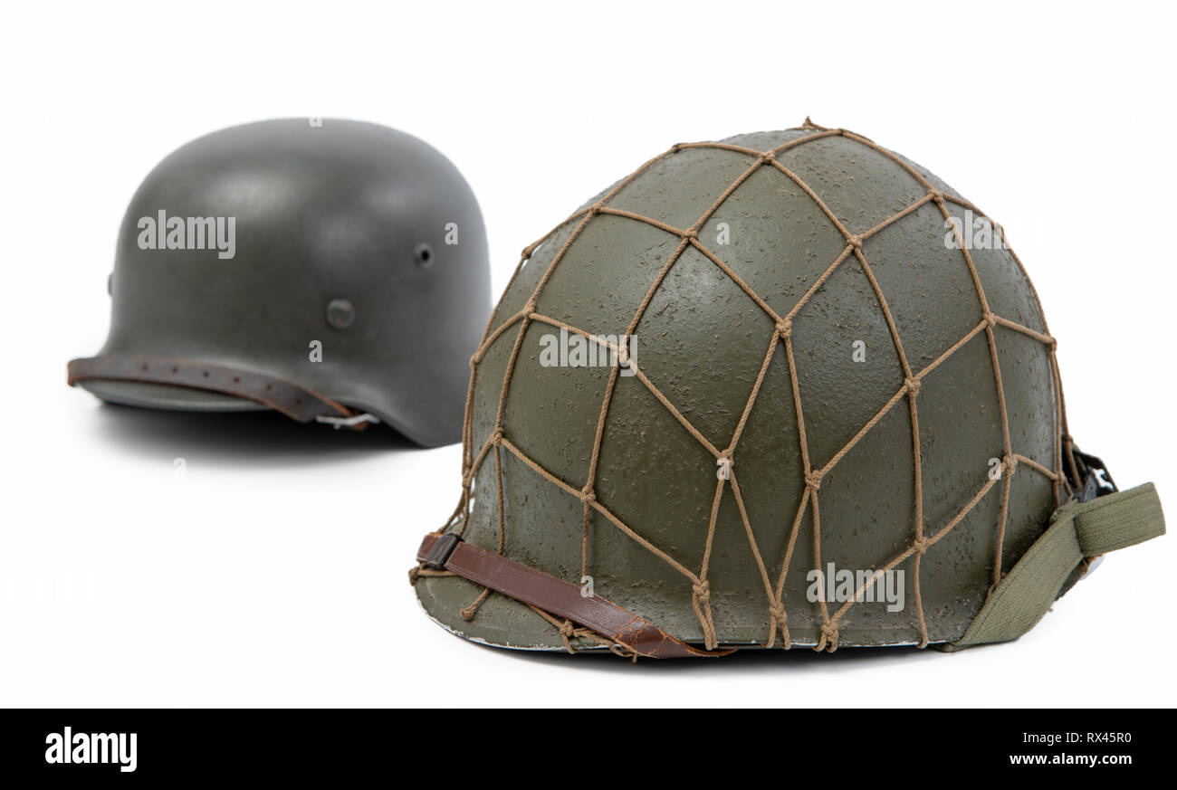 U.S and German World War Two military helmets, a battle of Normandy ...