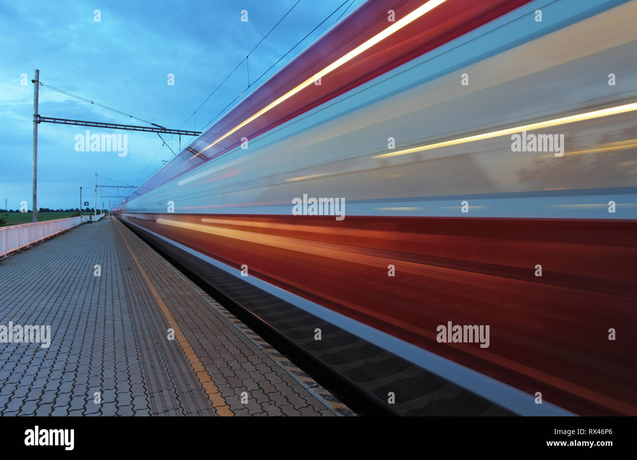 Speeding train at station hi-res stock photography and images - Alamy