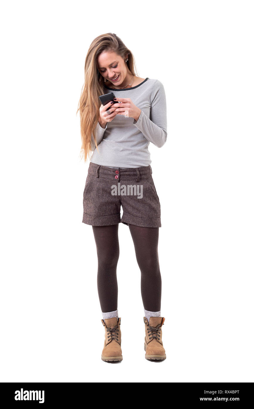 Young relaxed beautiful woman in alternative style clothing surfing ...