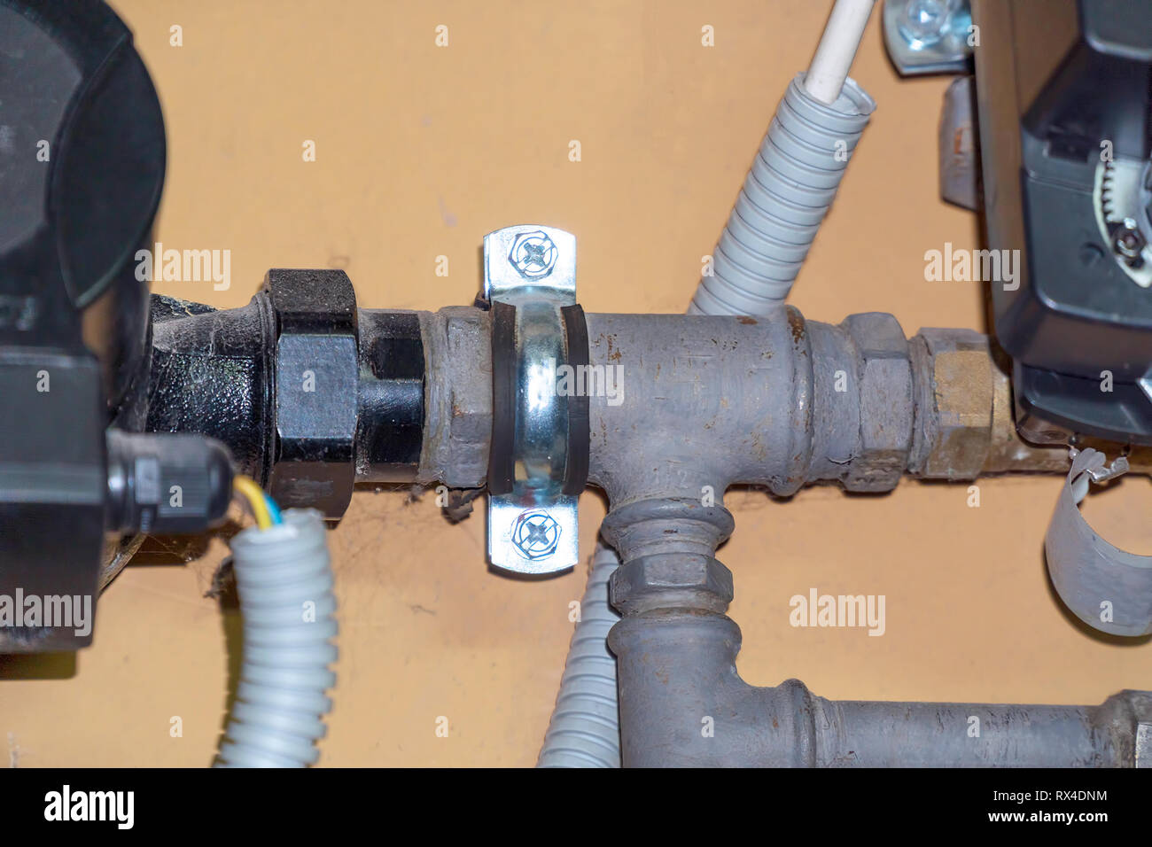 Connection of plastic pipes through tees fittings Stock Photo - Alamy