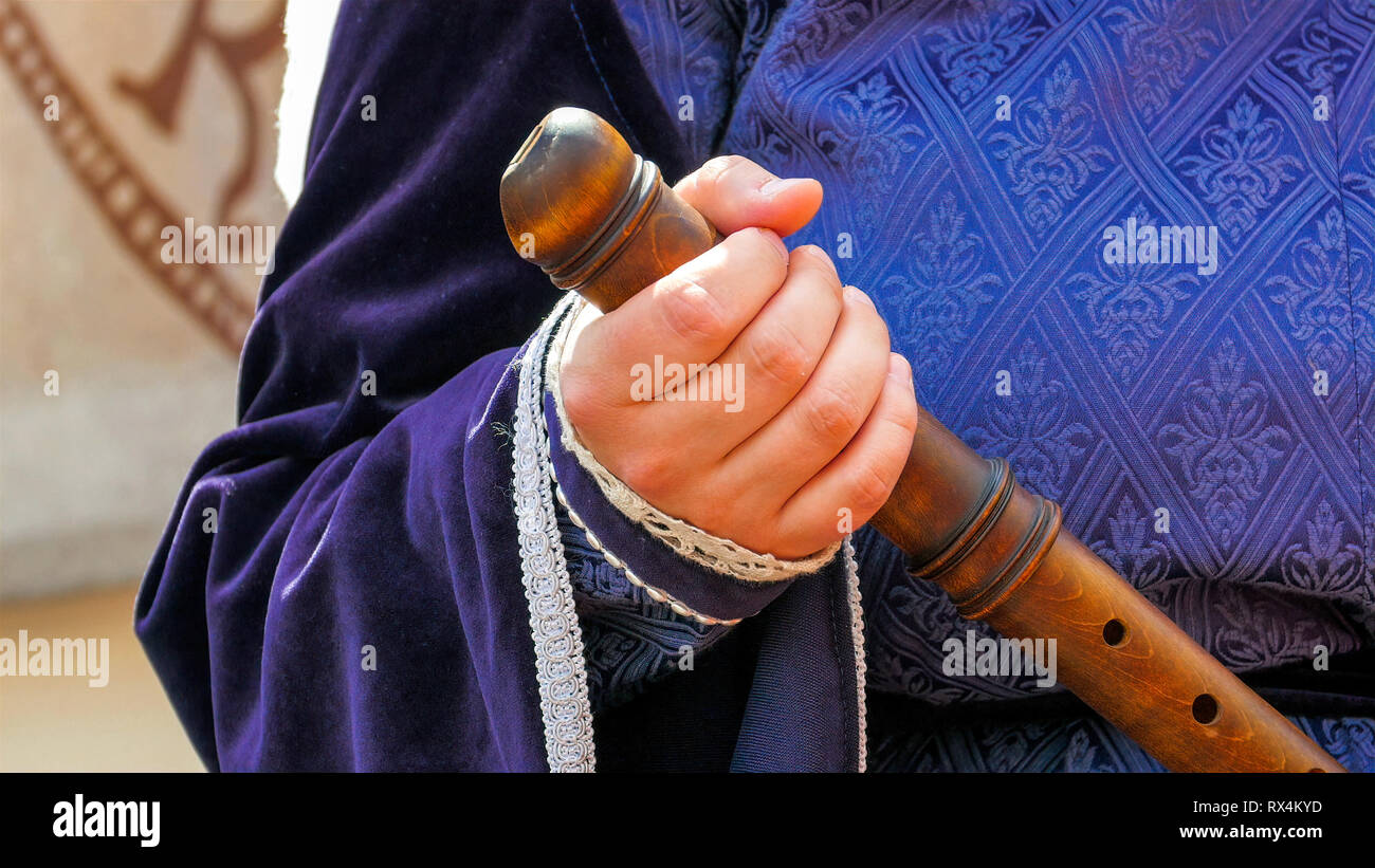Old man playing flute in hi-res stock photography and images - Alamy