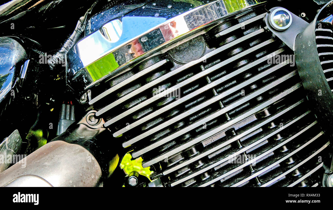Closer look of the motorbikes engine. The silver engine with the big ...