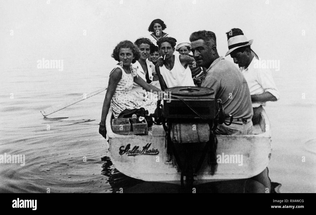 Group people on boats Black and White Stock Photos & Images - Alamy