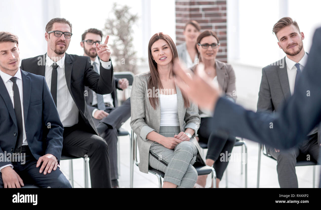 leader of the business people giving a speech in a conference room ...