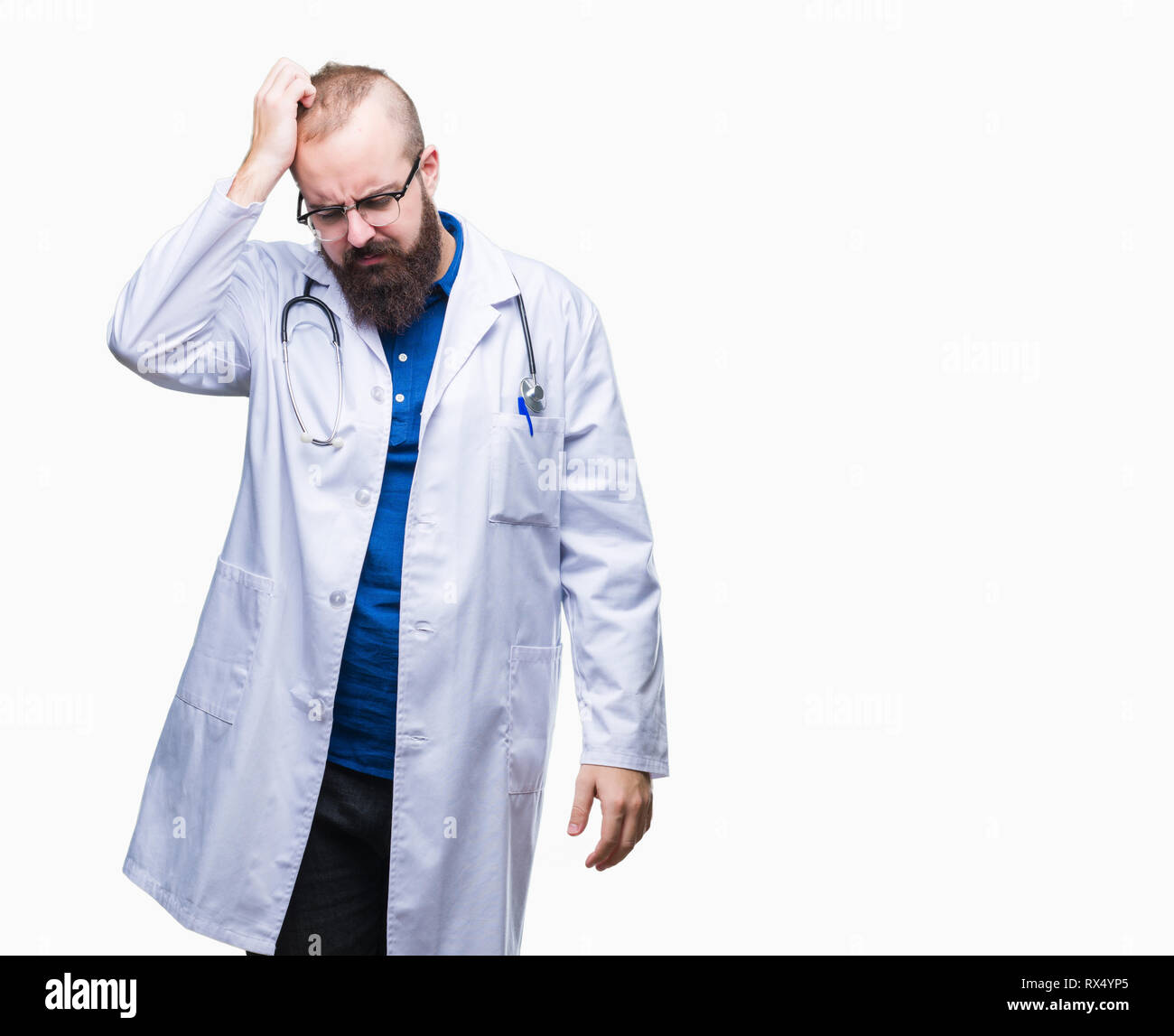 Young caucasian doctor man wearing medical white coat over isolated ...