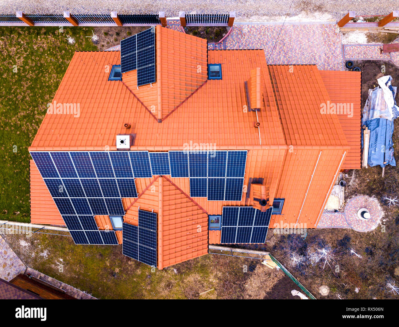 Aerial top view of new modern residential house cottage with blue shiny ...