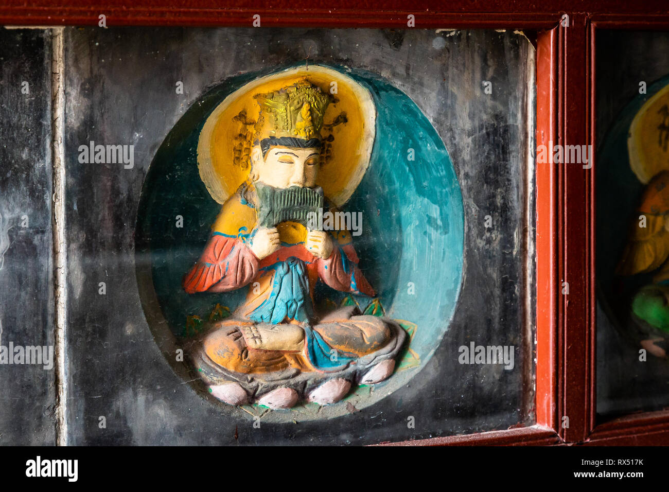 Some of the 10.000 brick statues of the Buddha with preserved colors ...