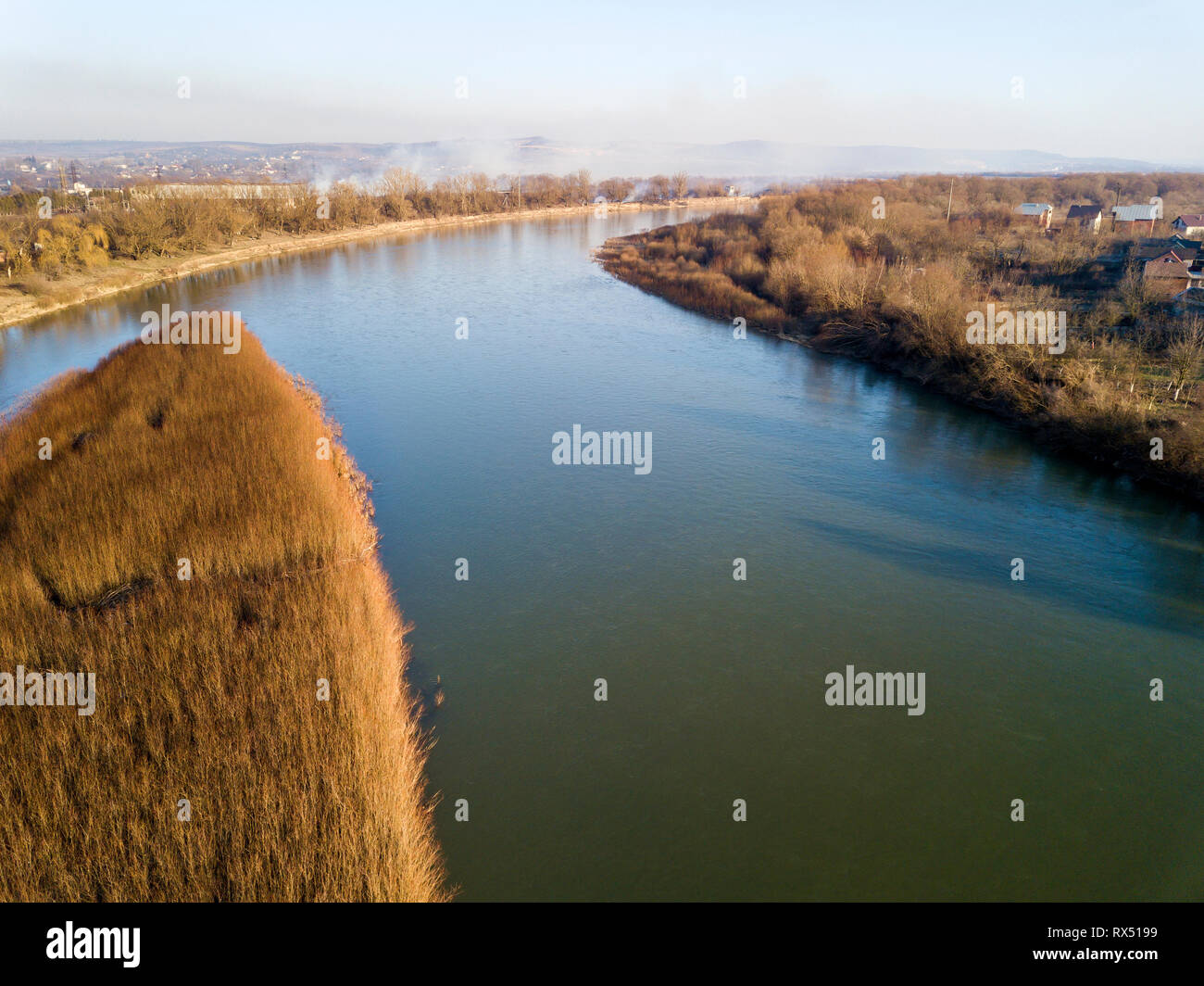 Aerial top view, countryside panorama of quiet river water and island ...