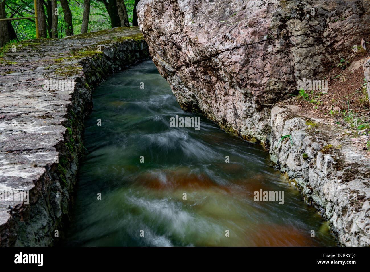 Aqueduct in the middle of the forest, on the mountain Beljanica, near ...