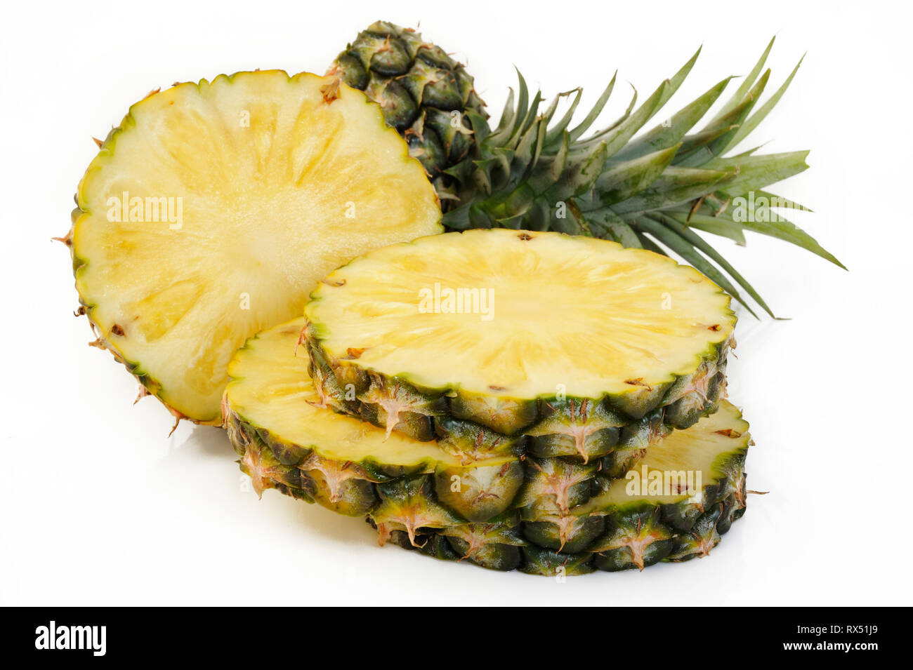 ripe pineapple on white background Stock Photo - Alamy