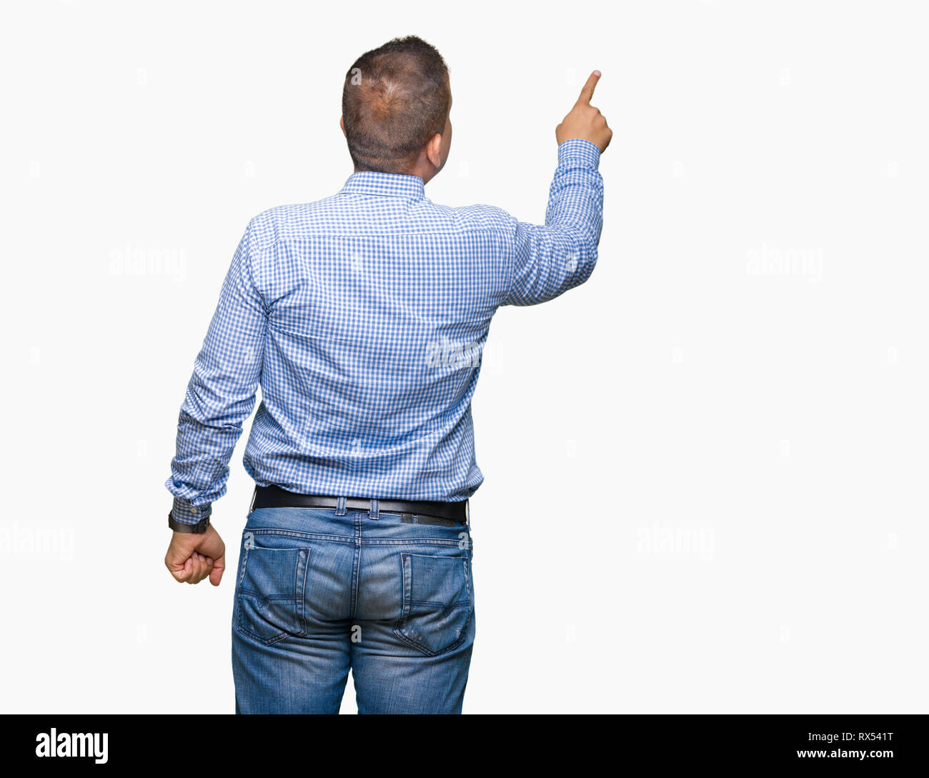 Middle age arab business man over isolated background Posing backwards ...