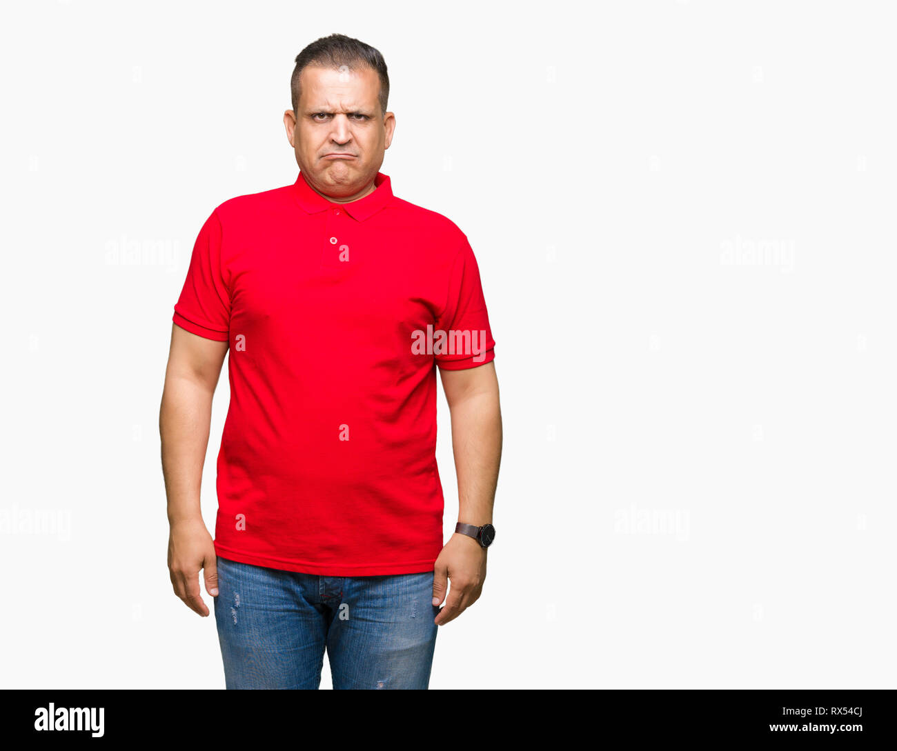 Middle age arab man over isolated background depressed and worry for ...