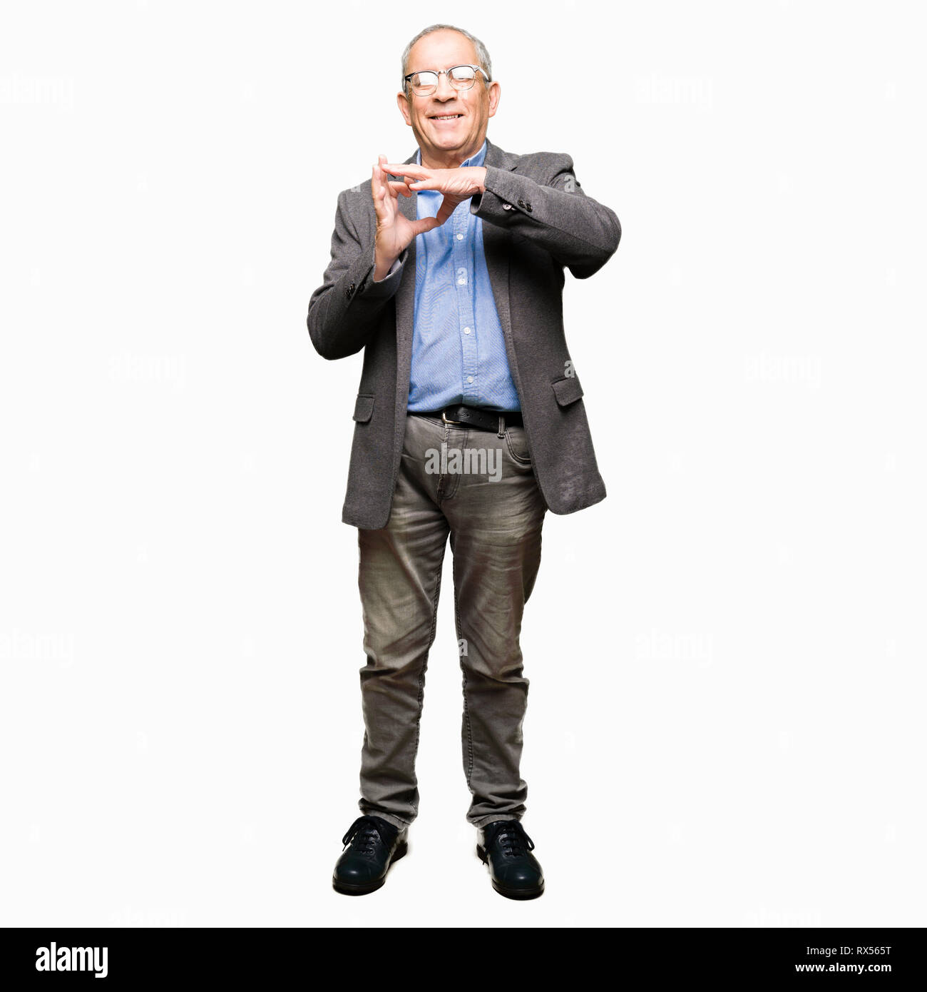 Smiling old couple making heart Cut Out Stock Images & Pictures - Alamy