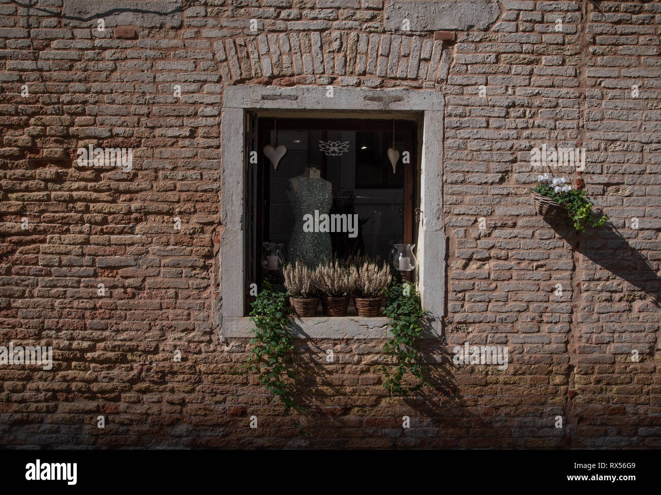 A shop window in a back street in Venice, well away from the main ...